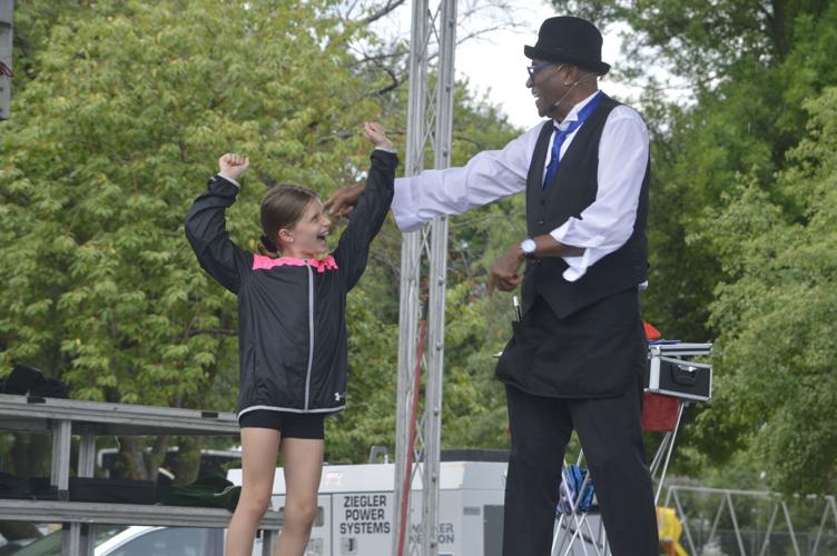 PHOTOS: Carnival, concerts make for jolly time at Giant Days | News ...