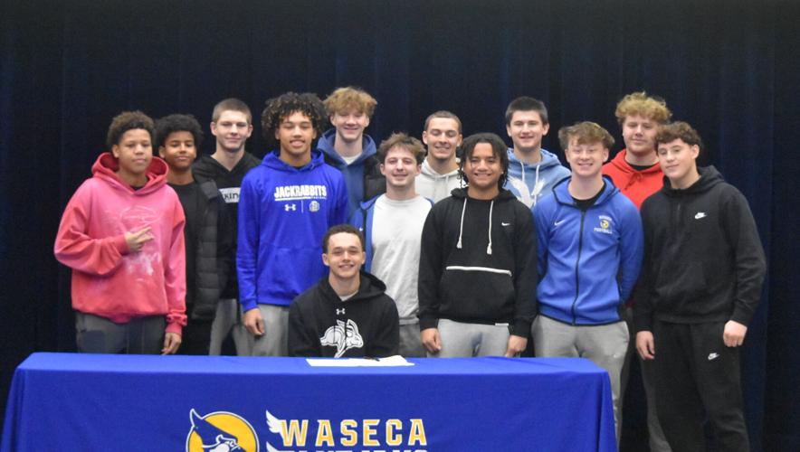 Russell signs with SDSU to continue to play football as defensive back ...
