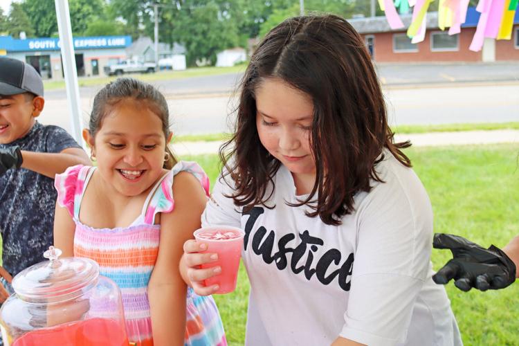 Summer school lemonade stand raising money for Transitional Housing ...