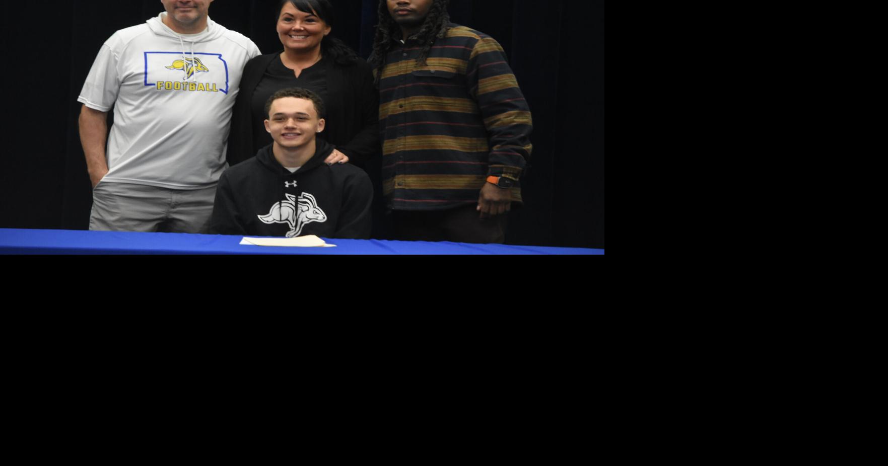 Russell signs with SDSU to continue to play football as defensive back ...