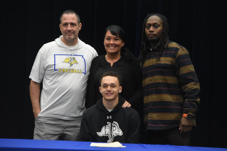 Russell signs with SDSU to continue to play football as defensive back ...