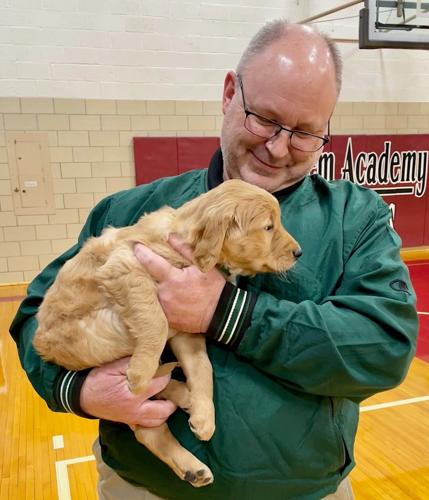 BA educator surprised with a puppy | Community | southernminn.com