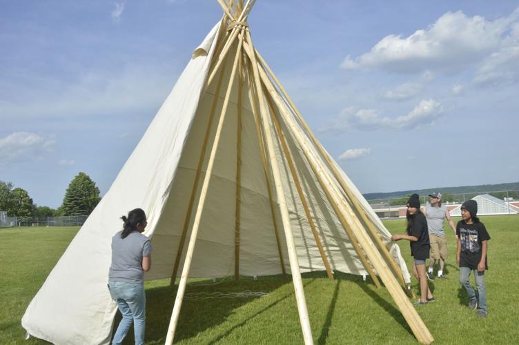 NAPAC builds tipi, hosts pow-wow dancers for end-of-year celebration ...