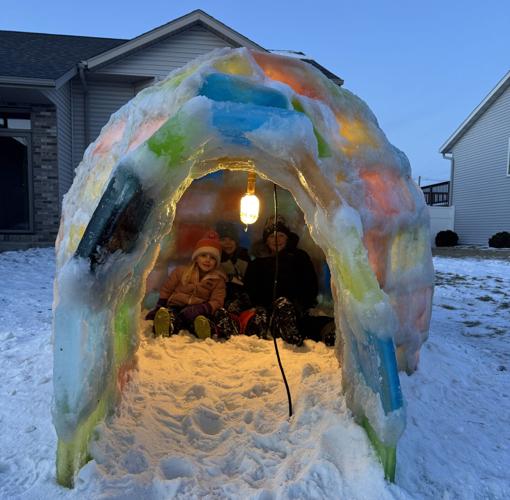 Beating cabin fever, local family builds igloo in front yard | News ...