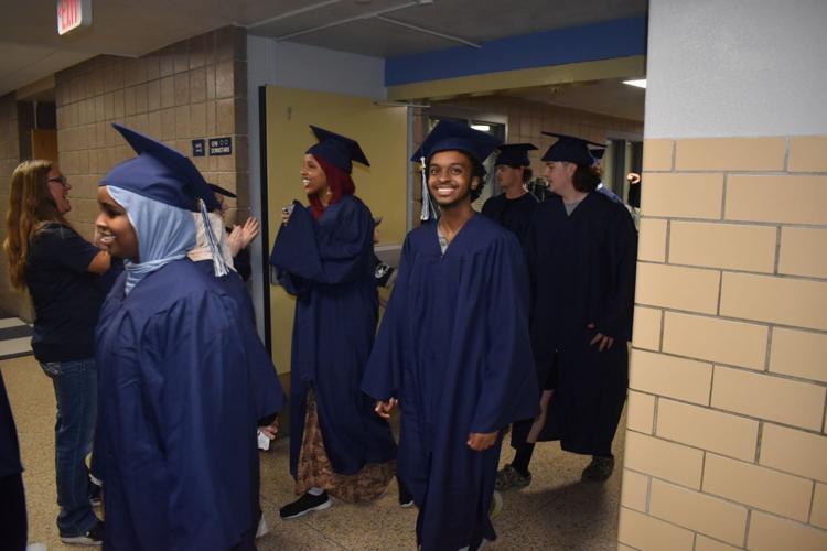 PHOTOS: St. Peter High School graduates parade through schools ...
