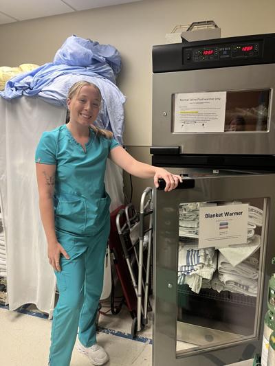 Auxiliary gifts warming cabinet to Owatonna Hospital | Community ...