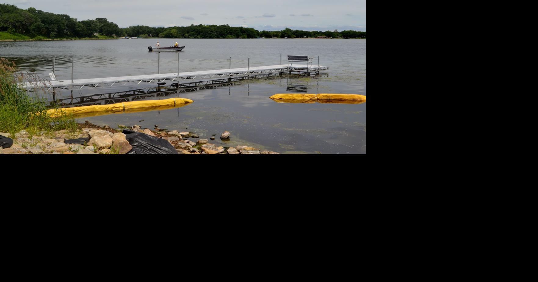 Council finds temporary resolution to private docks on public land ...