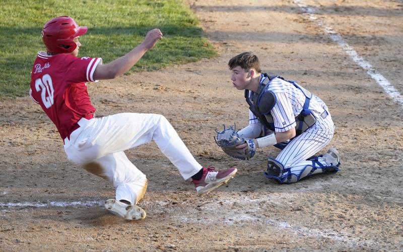 Huskies leave too many runners stranded in season-opening loss to ...