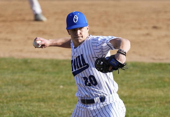 Huskies leave too many runners stranded in season-opening loss to ...