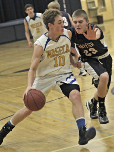 St. Peter boys basketball holds off strong challenge from Waseca ...