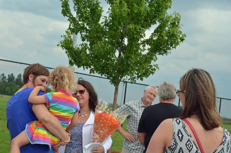 Moving past vandalism, family dedicates new tree in son's honor | News ...