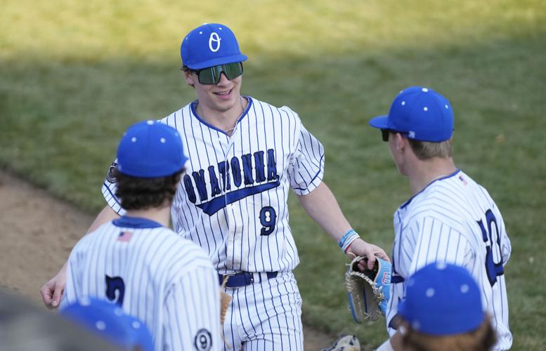 Huskies leave too many runners stranded in season-opening loss to ...