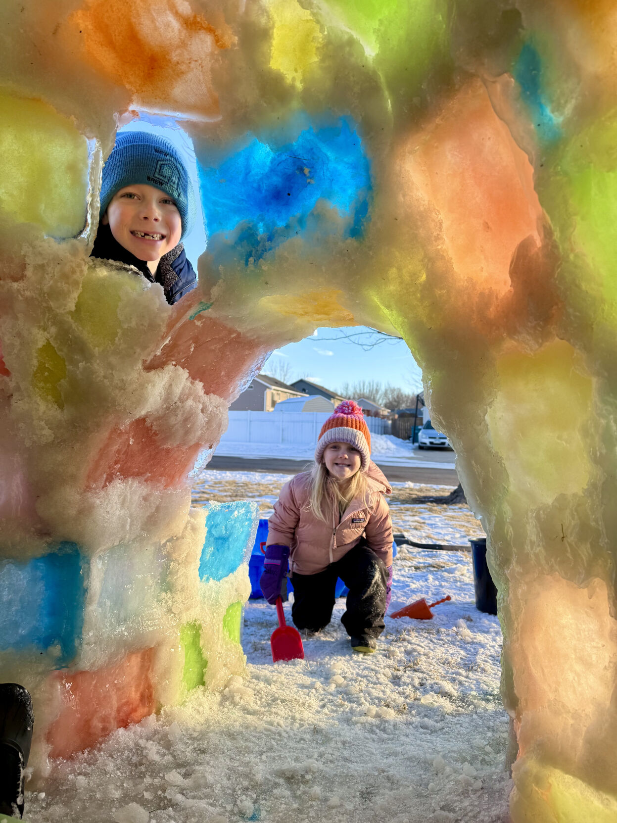 Beating cabin fever, local family builds igloo in front yard | News ...