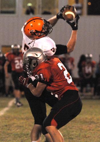 Sathrum, defense lead Kenyon-Wanamingo football to 28-13 win over St ...