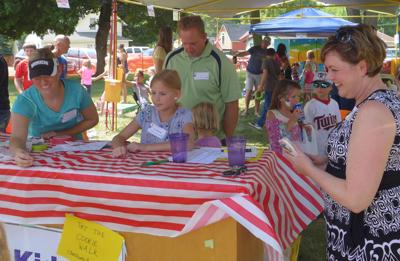 IC Church Bazaar brings back big wheel, introduces chicken plop game ...