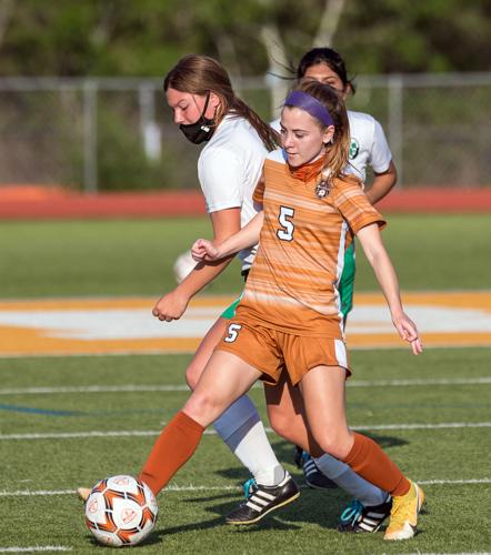 Lady Trojan soccer team ousted in first round after PK shootout ...
