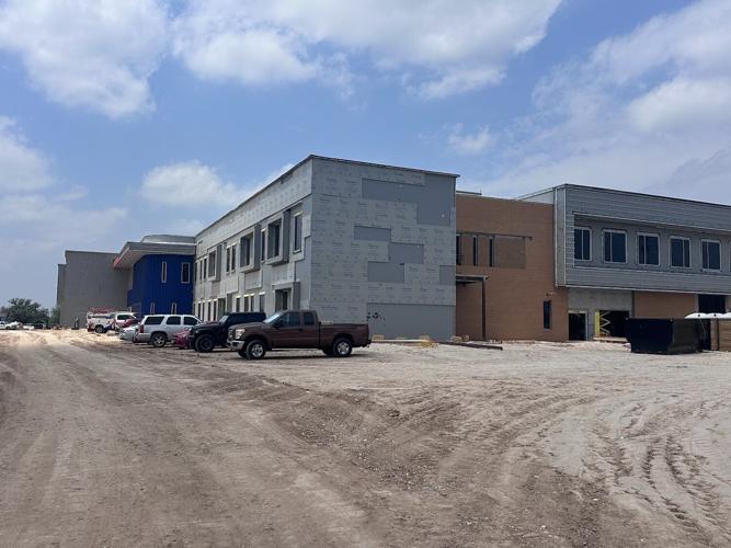 New elementary school takes shape with grade-level pods, central ...