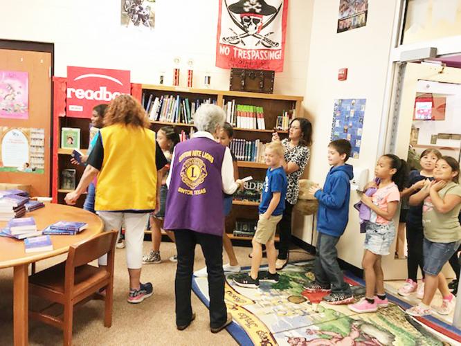 Sinton Nite Lions deliver Dictionaries | San Patricio County ...