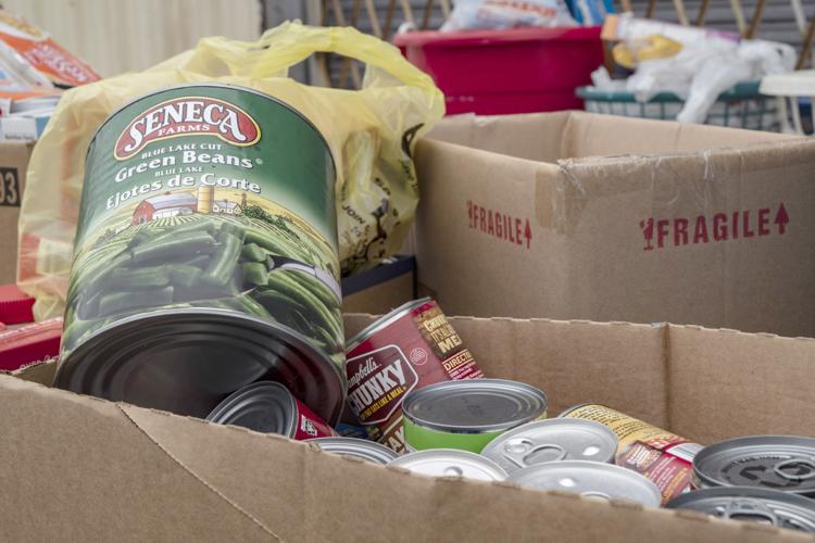 Lions collect, donate canned goods, focus on community service | News ...