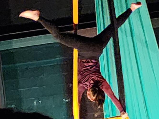 State Climb holds aerial silks performance