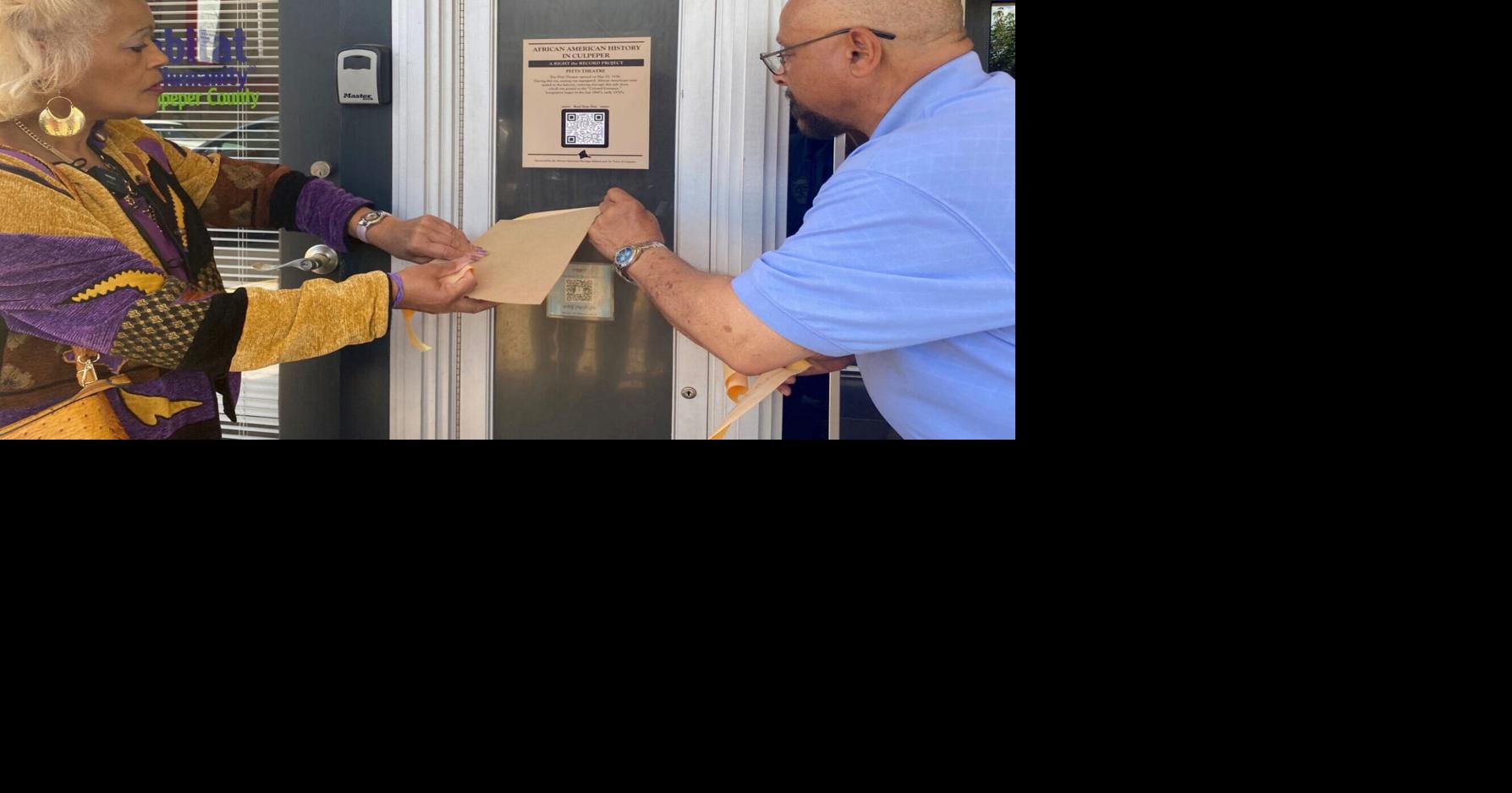 Right the Record historic plaque marks segregated entrance at Pitts Theatre