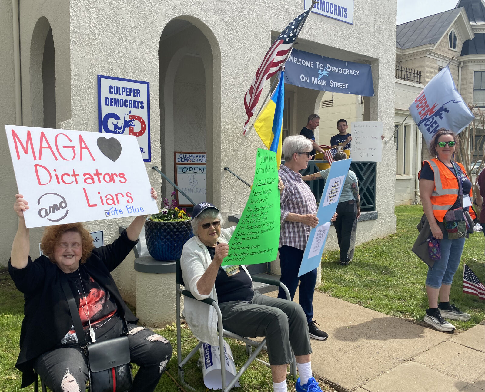 PHOTOS: Local demonstrators protest Trump administration