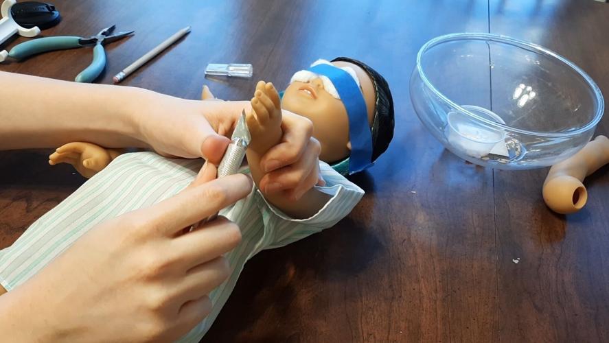 Virginia teen creates special doll for toddler born without thumbs