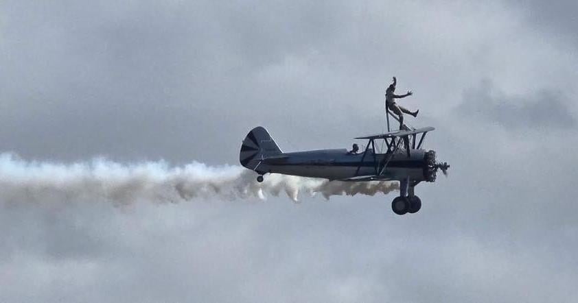 PHOTO: Flying Circus wing walker defies gravity