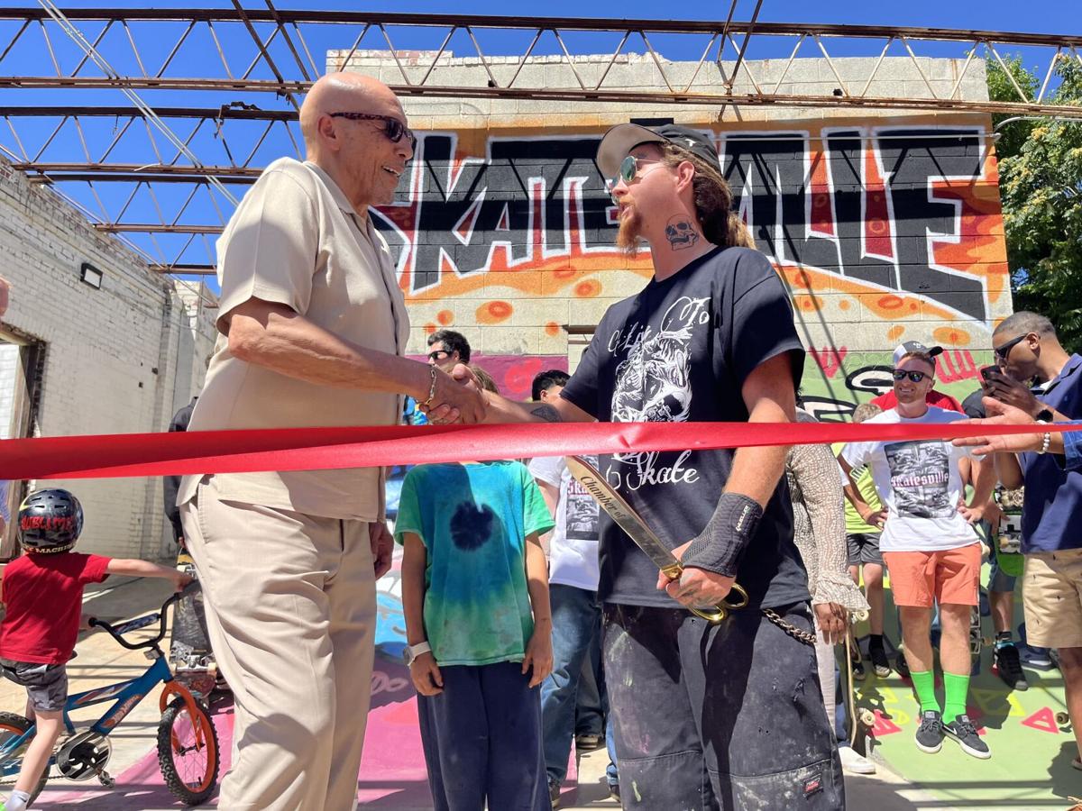 David J. Meachem and Christian Griffith shake hands at the Statesville ...
