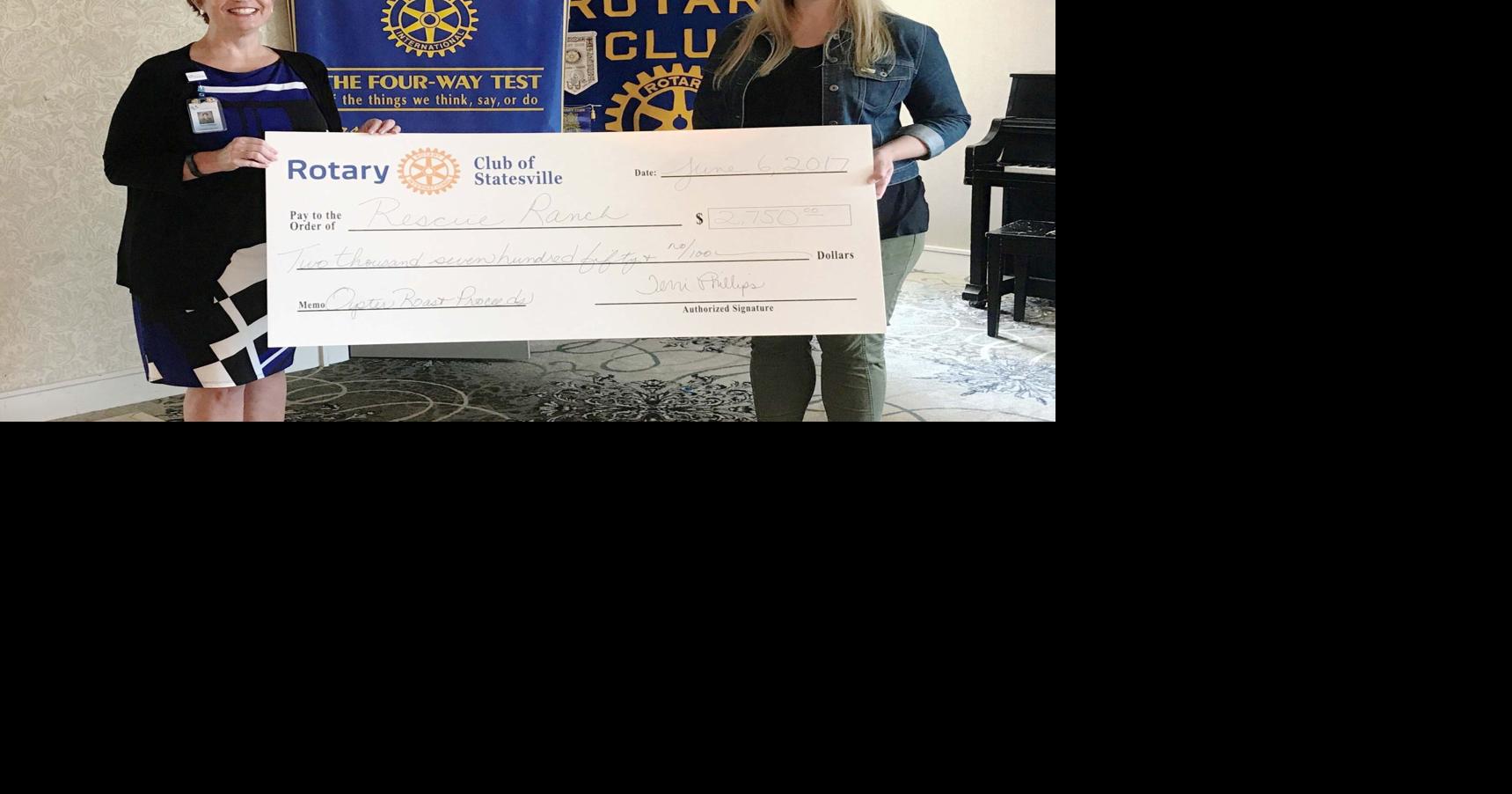 PHOTO: Rotary Club of Statesville gives to Rescue Ranch