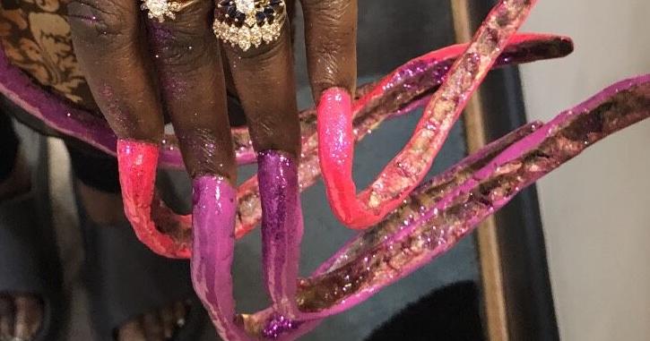 Iredell County NC woman shows off 12-inch nails