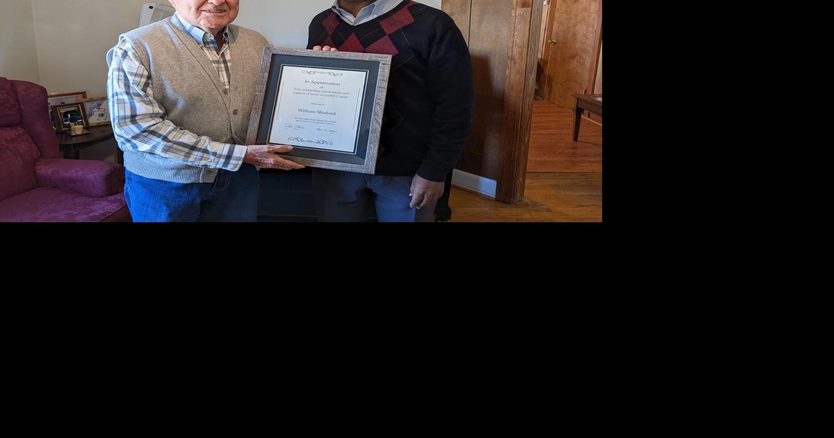 Broad Street UMC Prime Timers present certificate to William Shuford