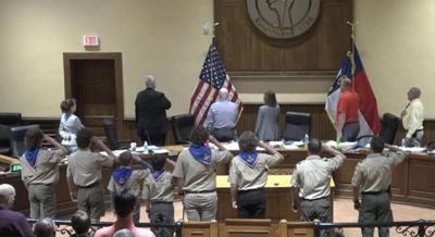 Statesville Scouts lead Pledge of Allegiance at commissioner's meeting