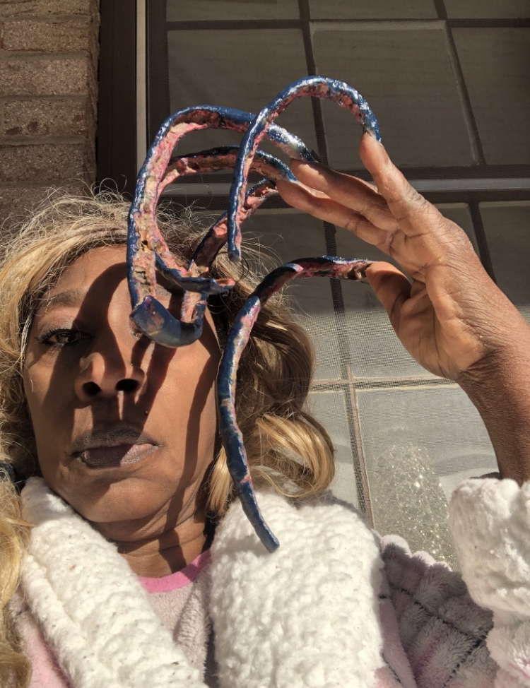 Iredell County NC woman shows off 12-inch nails