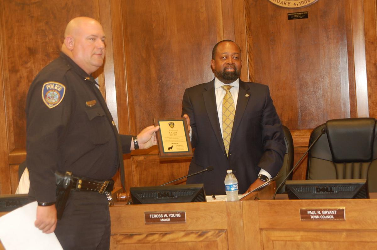 Troutman's first canine honored at council meeting