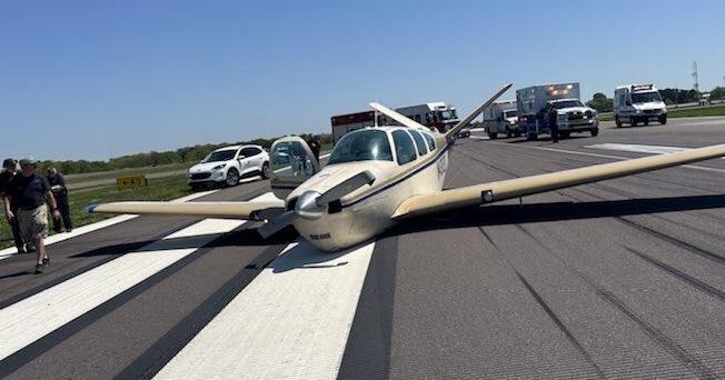 Airplane lands at Statesville airport with landing gear up
