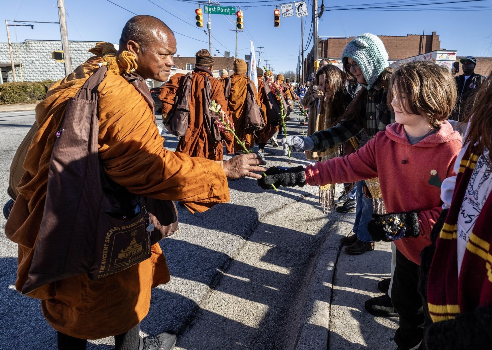 Monks bring message of peace to Guilford County NC