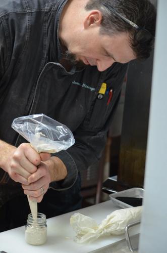 James Hettinger prepares a dessert at Chefry's Blue Smoke in ...