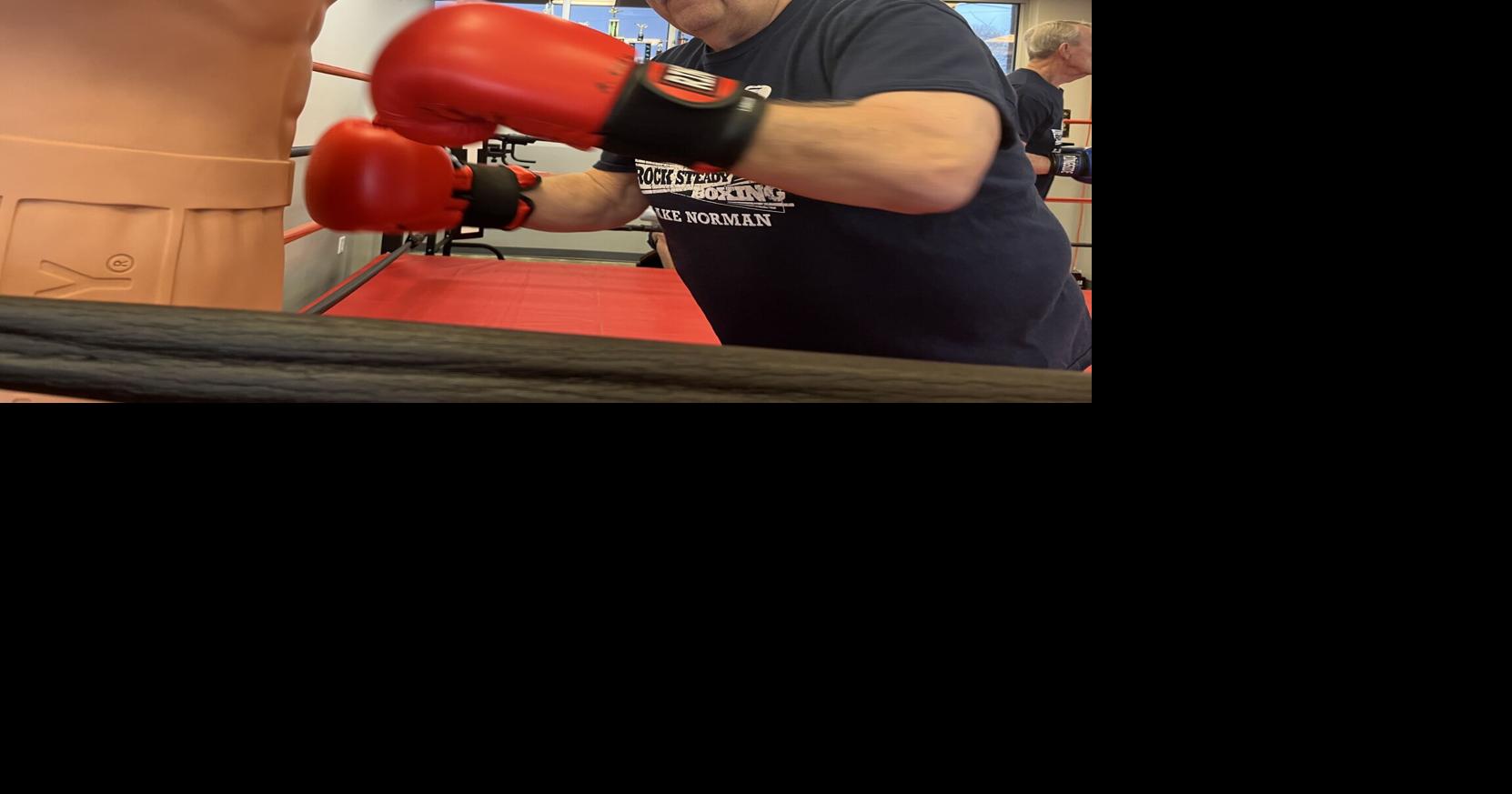 Roger Eddy throws punches at a boxing dummy at Lake Norman Muay Thai in ...