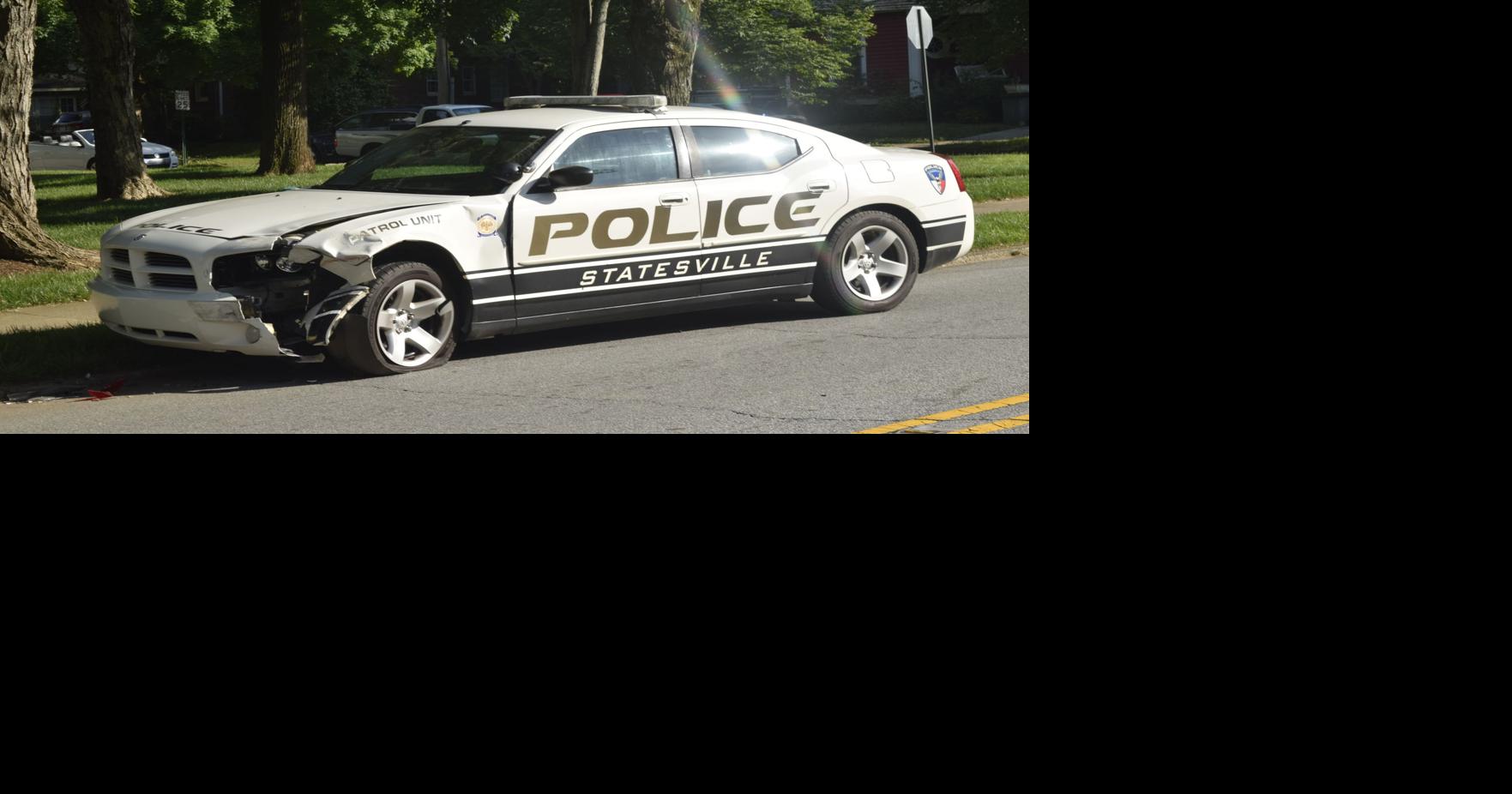 PHOTOS: Police car damaged in Wednesday accident; no injuries