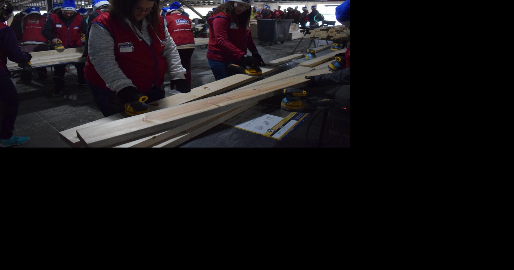 Lowe's employees build beds for children in need