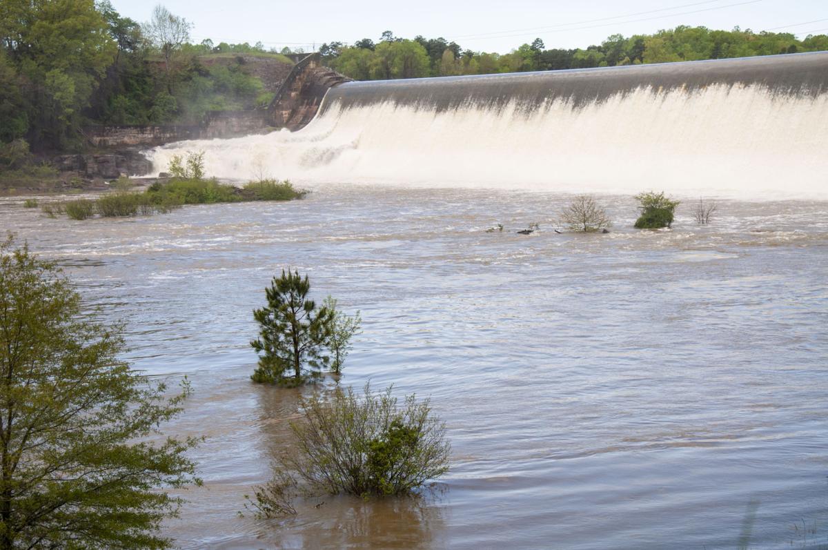 PHOTOS: Water rushes over Lookout Shoals Dam