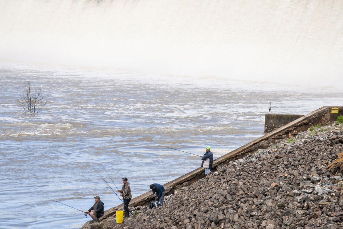 PHOTOS: Water rushes over Lookout Shoals Dam