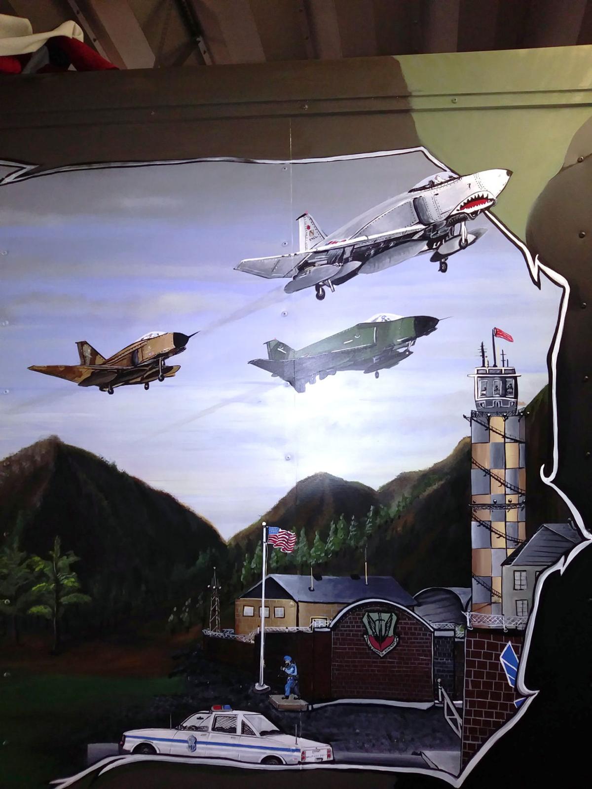 Statesville artist pours hundreds of hours into military-themed mural ...