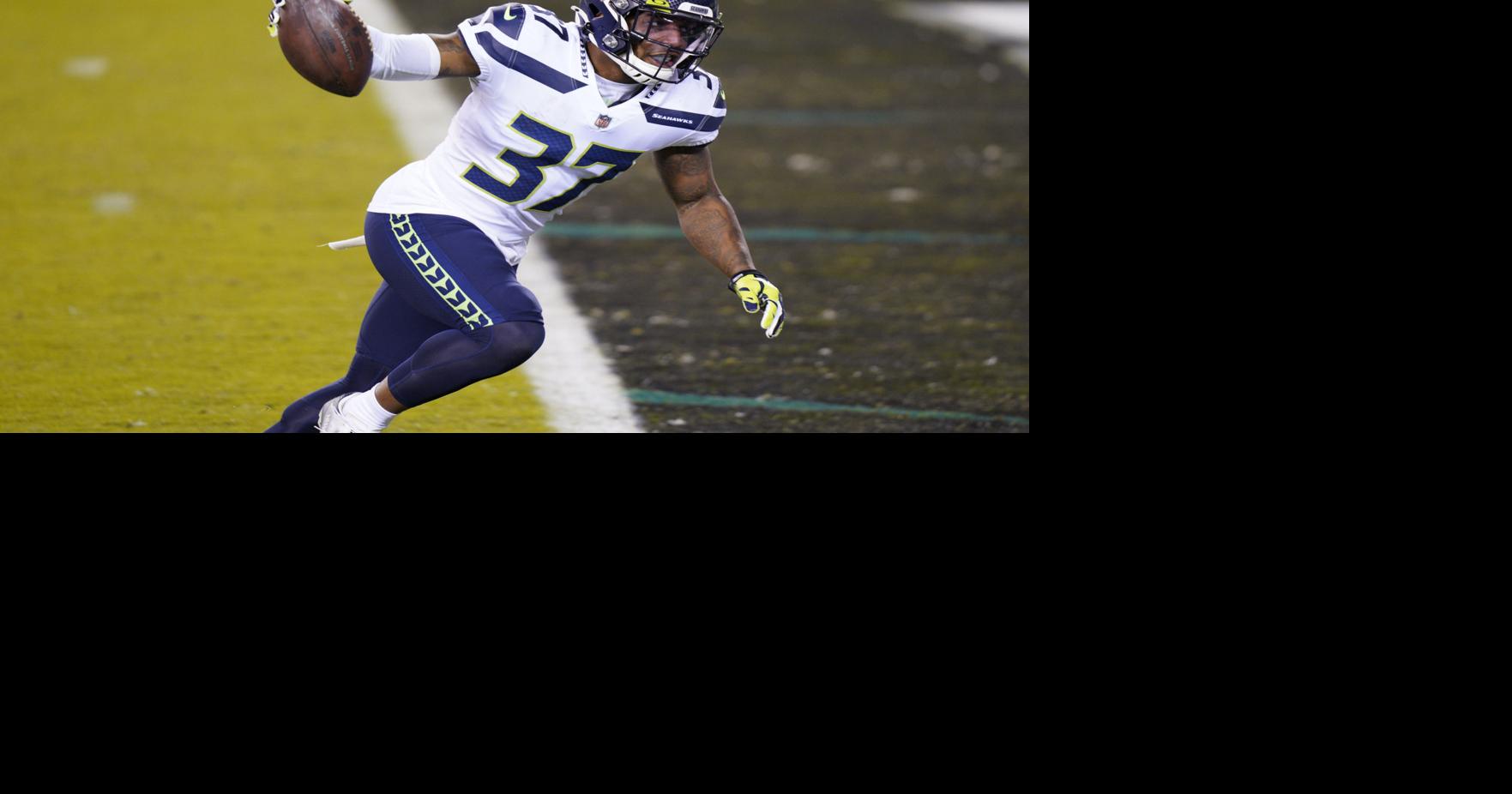 Metcalf helps Seahawks upend Eagles