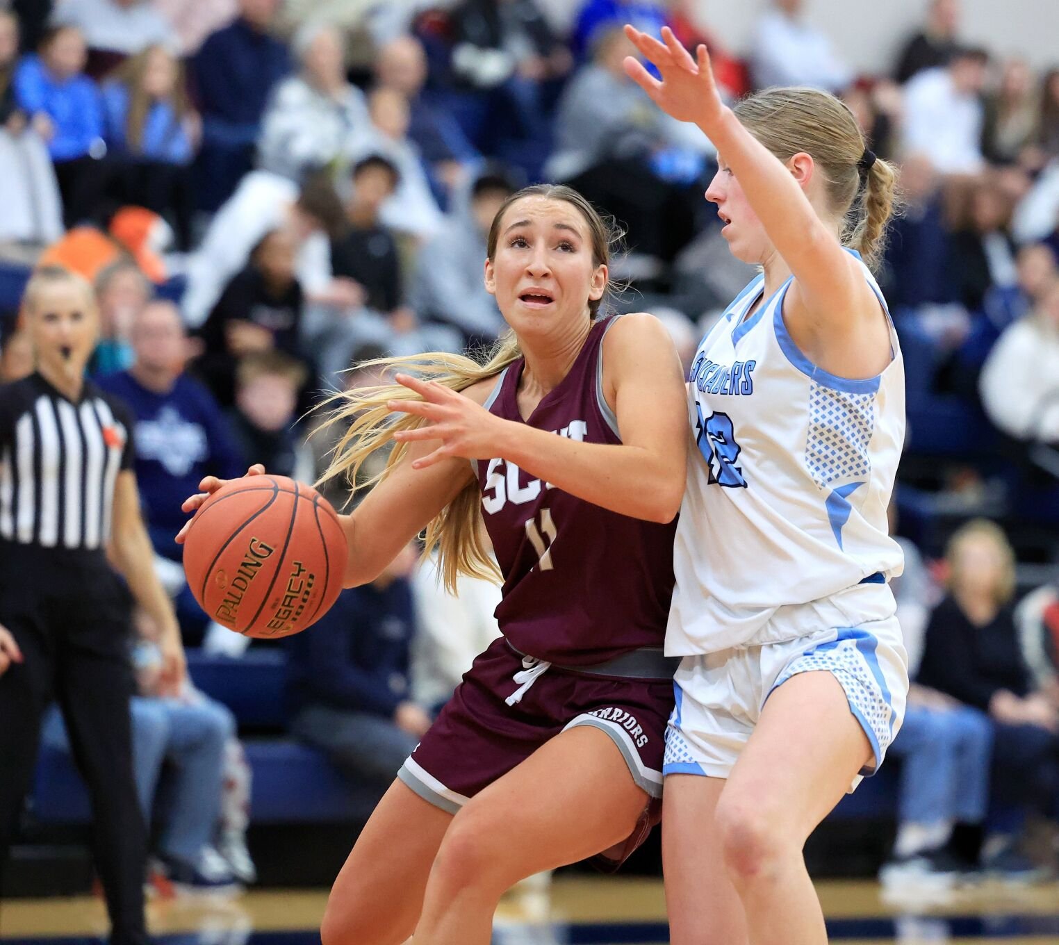 Miley Jackson takes charge to lead St. Charles West past host in St. Dominic final