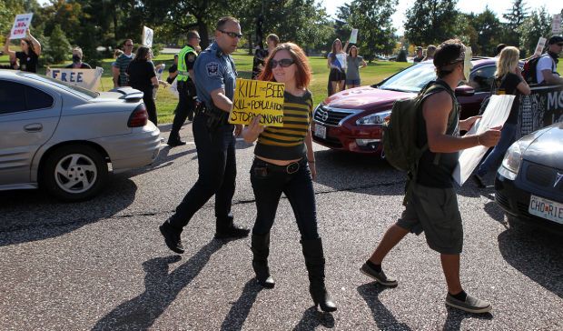 Hundreds protest outside Monsanto headquarters in St. Louis
