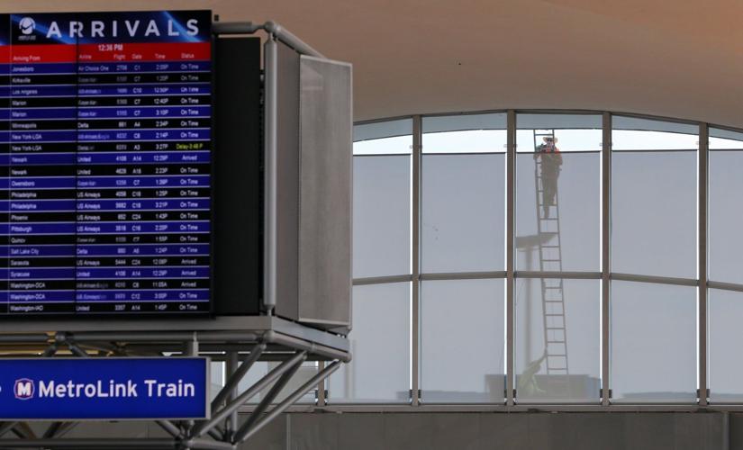 Main Lambert terminal gets shiny, new roof