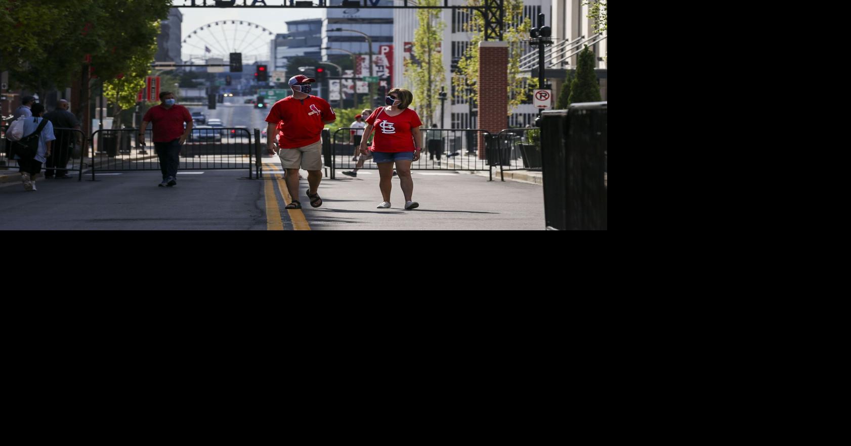 Cardinals fans outside Busch Stadium adjust to an opening day unlike ...