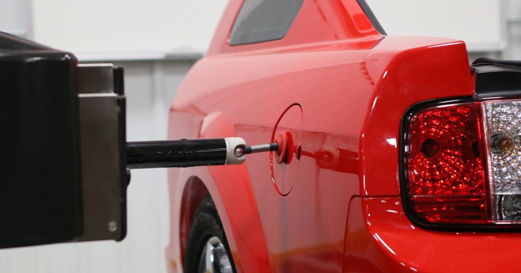 Robogas? Pacific company's robotic fuel pump fills the tank while you ...